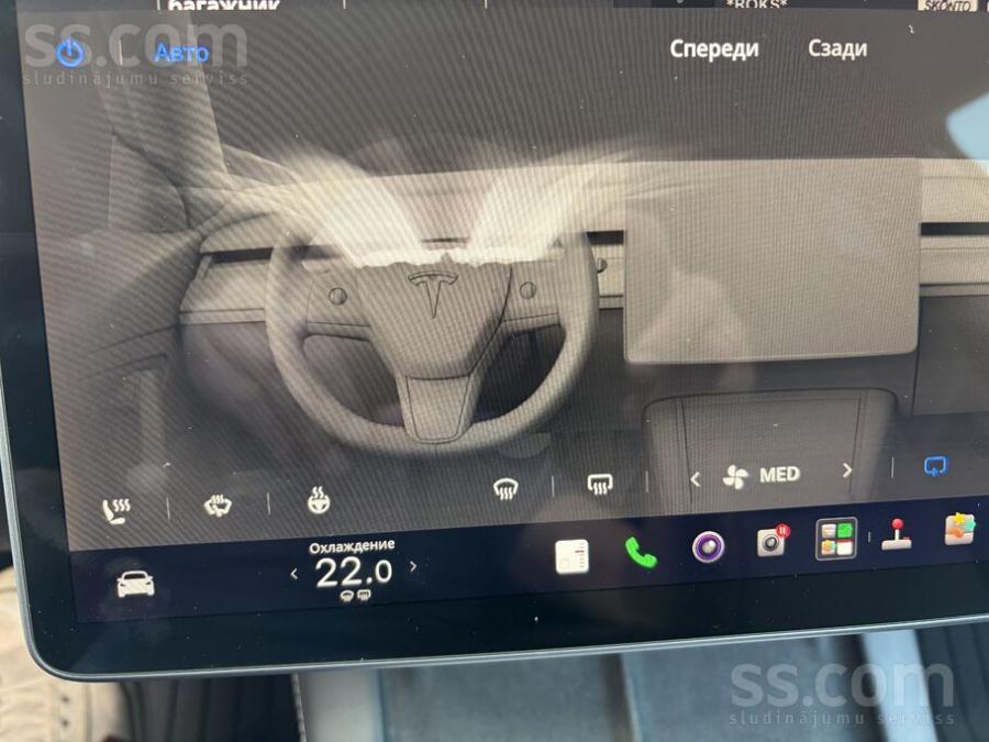 Grey Tesla Model 3 2022 in Riga, with an engine capacity of 0.00 L and mileage of 124 thousand km for 27300 €, photo 13 on AUTOMOTO.COM.LV