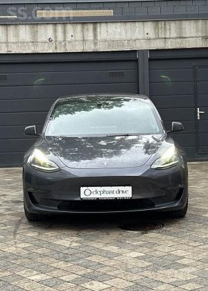 Grey Tesla Model 3 2023 in Riga, with an engine capacity of 0.00 L and mileage of 36 thousand km for 32870 €, photo 3 on AUTOMOTO.COM.LV