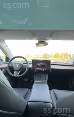 Grey Tesla Model 3 2023 in Riga, with an engine capacity of 0.00 L and mileage of 36 thousand km for 32870 €, photo 6 on AUTOMOTO.COM.LV