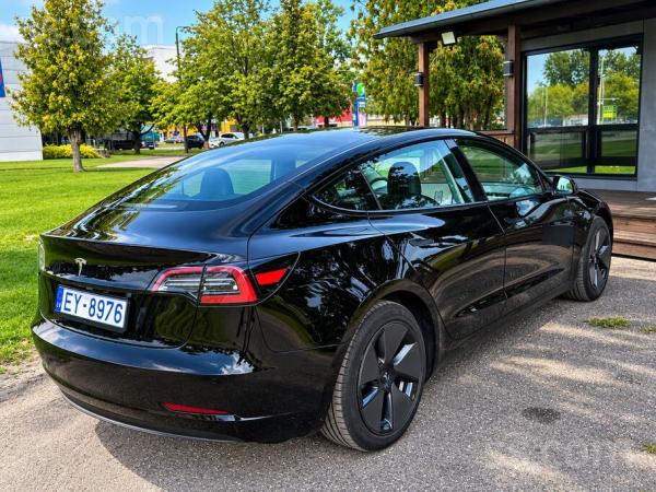 Grey Tesla Model 3 2023 in Riga, with an engine capacity of 0.00 L and mileage of 73 thousand km for 27600 €, photo 9 on AUTOMOTO.COM.LV