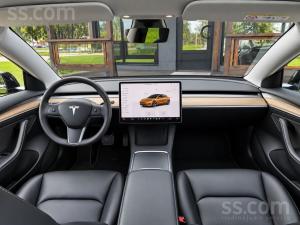 Grey Tesla Model 3 2023 in Riga, with an engine capacity of 0.00 L and mileage of 73 thousand km for 27600 €, photo 11 on AUTOMOTO.COM.LV