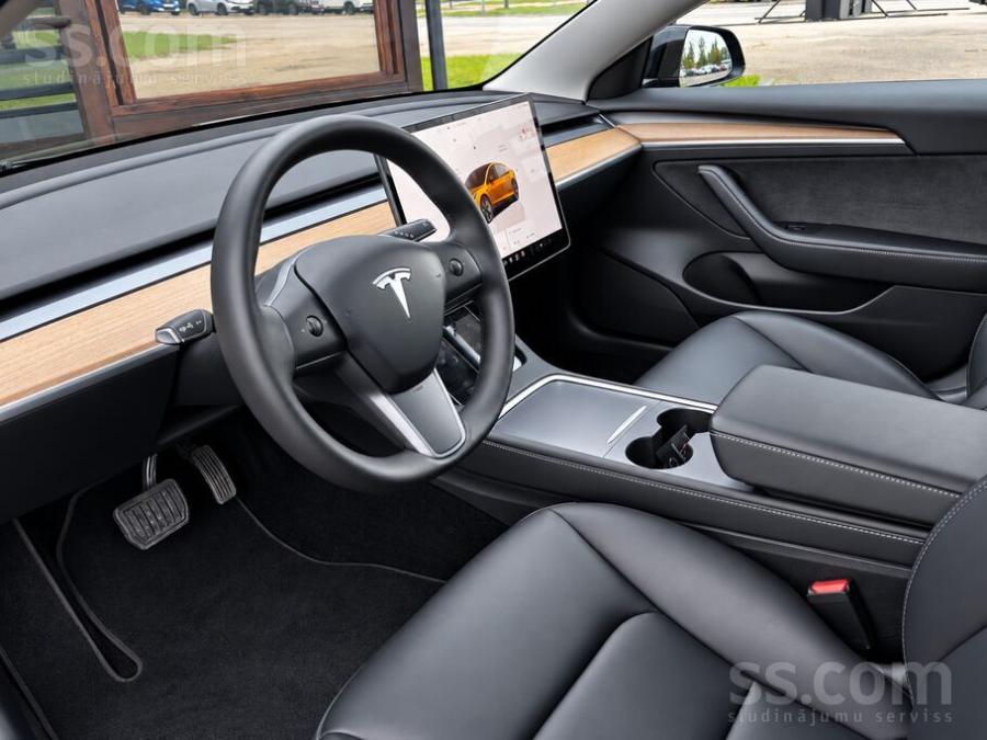 Grey Tesla Model 3 2023 in Riga, with an engine capacity of 0.00 L and mileage of 73 thousand km for 27600 €, photo 13 on AUTOMOTO.COM.LV
