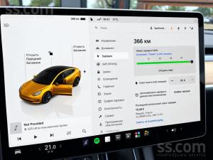 Grey Tesla Model 3 2023 in Riga, with an engine capacity of 0.00 L and mileage of 73 thousand km for 27600 €, photo 17 on AUTOMOTO.COM.LV
