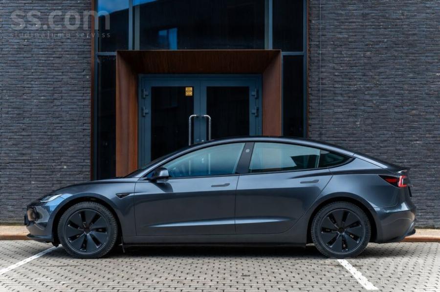 Grey Tesla Model 3 2024 in Riga, with an engine capacity of 0.00 L and mileage of 103 thousand km for 37900 €, photo 7 on AUTOMOTO.COM.LV