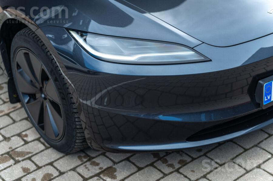 Grey Tesla Model 3 2024 in Riga, with an engine capacity of 0.00 L and mileage of 103 thousand km for 37900 €, photo 11 on AUTOMOTO.COM.LV