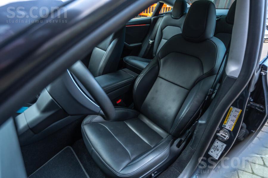 Grey Tesla Model 3 2024 in Riga, with an engine capacity of 0.00 L and mileage of 103 thousand km for 37900 €, photo 16 on AUTOMOTO.COM.LV