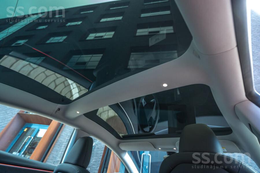 Grey Tesla Model 3 2024 in Riga, with an engine capacity of 0.00 L and mileage of 103 thousand km for 37900 €, photo 23 on AUTOMOTO.COM.LV