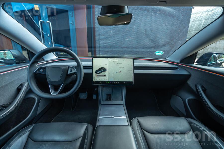Grey Tesla Model 3 2024 in Riga, with an engine capacity of 0.00 L and mileage of 103 thousand km for 37900 €, photo 27 on AUTOMOTO.COM.LV