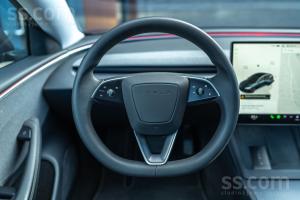 Grey Tesla Model 3 2024 in Riga, with an engine capacity of 0.00 L and mileage of 103 thousand km for 37900 €, photo 28 on AUTOMOTO.COM.LV
