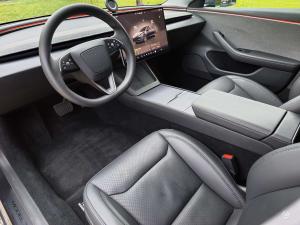 Grey Tesla Model 3 2024 in Kaunas, with an engine capacity of 0.00 L and mileage of 11 thousand km for 29990 €, photo 13 on AUTOMOTO.COM.LV