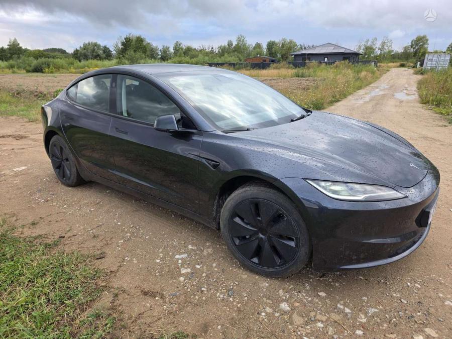 Grey Tesla Model 3 2025 in Kaunas, with an engine capacity of 0.00 L and mileage of 14 thousand km for 41000 €, photo 3 on AUTOMOTO.COM.LV