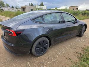 Grey Tesla Model 3 2025 in Kaunas, with an engine capacity of 0.00 L and mileage of 14 thousand km for 41000 €, photo 4 on AUTOMOTO.COM.LV