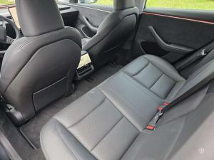 Grey Tesla Model 3 2025 in Kaunas, with an engine capacity of 0.00 L and mileage of 14 thousand km for 41000 €, photo 6 on AUTOMOTO.COM.LV