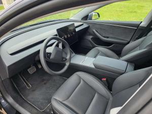 Grey Tesla Model 3 2025 in Kaunas, with an engine capacity of 0.00 L and mileage of 14 thousand km for 41000 €, photo 7 on AUTOMOTO.COM.LV