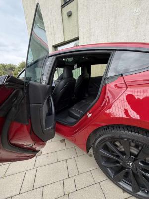 Red Tesla Model 3 2018 in Vilnius, with an engine capacity of 0.00 L and mileage of 198 thousand km for 16900 €, photo 12 on AUTOMOTO.COM.LV