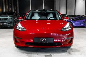 Red Tesla Model 3 2019 in Riga, with an engine capacity of 0.00 L and mileage of 140 thousand km for 23900 €, photo 3 on AUTOMOTO.COM.LV