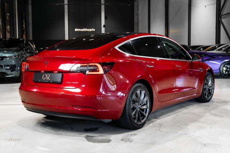 Red Tesla Model 3 2019 in Riga, with an engine capacity of 0.00 L and mileage of 140 thousand km for 23900 €, photo 5 on AUTOMOTO.COM.LV
