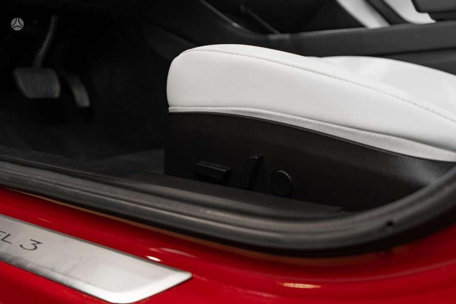 Red Tesla Model 3 2019 in Riga, with an engine capacity of 0.00 L and mileage of 140 thousand km for 23900 €, photo 18 on AUTOMOTO.COM.LV