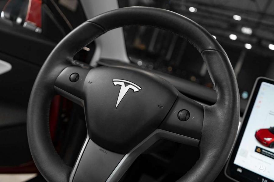 Red Tesla Model 3 2019 in Riga, with an engine capacity of 0.00 L and mileage of 140 thousand km for 23900 €, photo 20 on AUTOMOTO.COM.LV