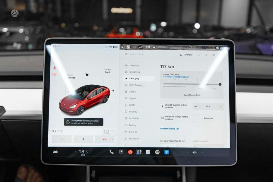 Red Tesla Model 3 2019 in Riga, with an engine capacity of 0.00 L and mileage of 140 thousand km for 23900 €, photo 23 on AUTOMOTO.COM.LV