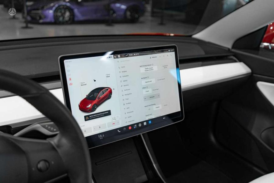 Red Tesla Model 3 2019 in Riga, with an engine capacity of 0.00 L and mileage of 140 thousand km for 23900 €, photo 27 on AUTOMOTO.COM.LV