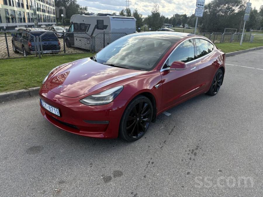 Red Tesla Model 3 2019 in Riga, with an engine capacity of 0.00 L and mileage of 173 thousand km for 21000 €, photo 1 on AUTOMOTO.COM.LV