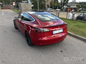 Red Tesla Model 3 2019 in Riga, with an engine capacity of 0.00 L and mileage of 173 thousand km for 21000 €, photo 5 on AUTOMOTO.COM.LV
