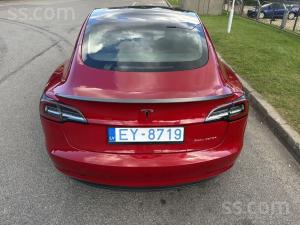 Red Tesla Model 3 2019 in Riga, with an engine capacity of 0.00 L and mileage of 173 thousand km for 21000 €, photo 6 on AUTOMOTO.COM.LV