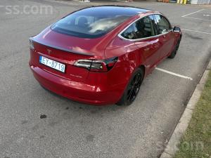 Red Tesla Model 3 2019 in Riga, with an engine capacity of 0.00 L and mileage of 173 thousand km for 21000 €, photo 7 on AUTOMOTO.COM.LV