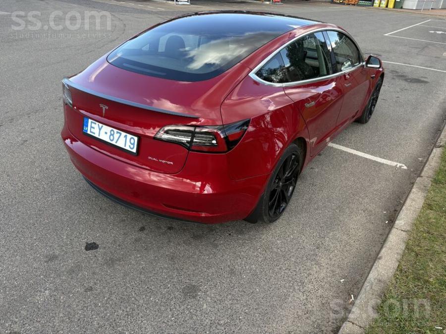 Red Tesla Model 3 2019 in Riga, with an engine capacity of 0.00 L and mileage of 173 thousand km for 21000 €, photo 7 on AUTOMOTO.COM.LV