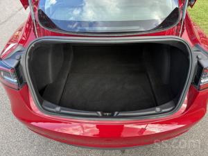 Red Tesla Model 3 2019 in Riga, with an engine capacity of 0.00 L and mileage of 173 thousand km for 21000 €, photo 11 on AUTOMOTO.COM.LV