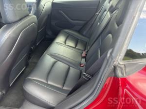 Red Tesla Model 3 2019 in Riga, with an engine capacity of 0.00 L and mileage of 173 thousand km for 21000 €, photo 12 on AUTOMOTO.COM.LV