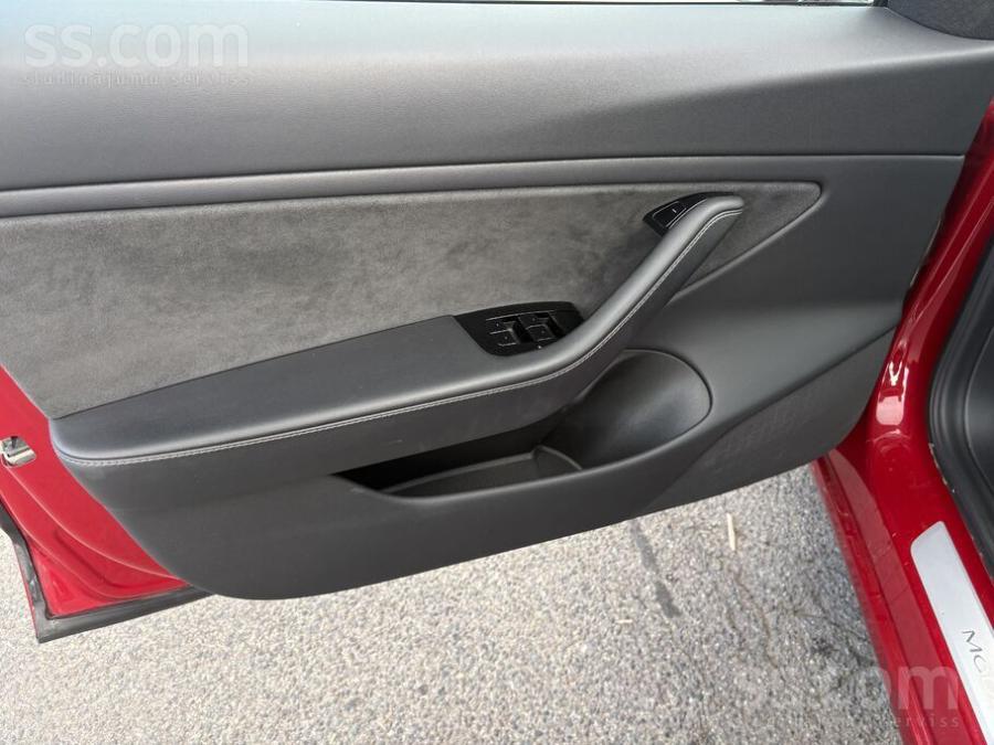 Red Tesla Model 3 2019 in Riga, with an engine capacity of 0.00 L and mileage of 173 thousand km for 21000 €, photo 15 on AUTOMOTO.COM.LV