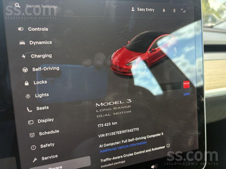 Red Tesla Model 3 2019 in Riga, with an engine capacity of 0.00 L and mileage of 173 thousand km for 21000 €, photo 16 on AUTOMOTO.COM.LV