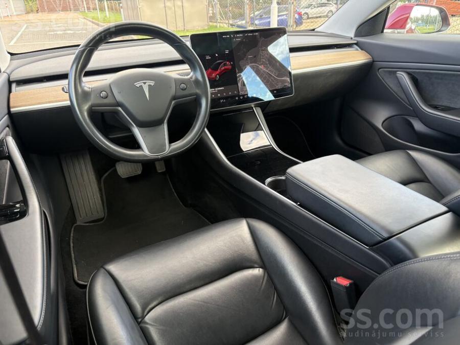 Red Tesla Model 3 2019 in Riga, with an engine capacity of 0.00 L and mileage of 173 thousand km for 21000 €, photo 17 on AUTOMOTO.COM.LV