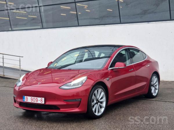 Red Tesla Model 3 2020 in Riga, with an engine capacity of 0.00 L and mileage of 126 thousand km for 21777 €, photo 1 on AUTOMOTO.COM.LV