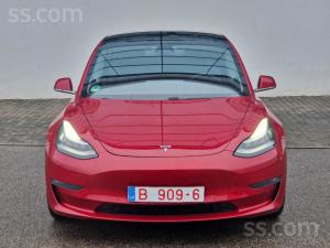 Red Tesla Model 3 2020 in Riga, with an engine capacity of 0.00 L and mileage of 126 thousand km for 21777 €, photo 2 on AUTOMOTO.COM.LV