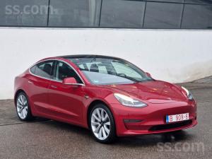 Red Tesla Model 3 2020 in Riga, with an engine capacity of 0.00 L and mileage of 126 thousand km for 21777 €, photo 3 on AUTOMOTO.COM.LV