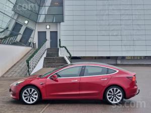 Red Tesla Model 3 2020 in Riga, with an engine capacity of 0.00 L and mileage of 126 thousand km for 21777 €, photo 5 on AUTOMOTO.COM.LV