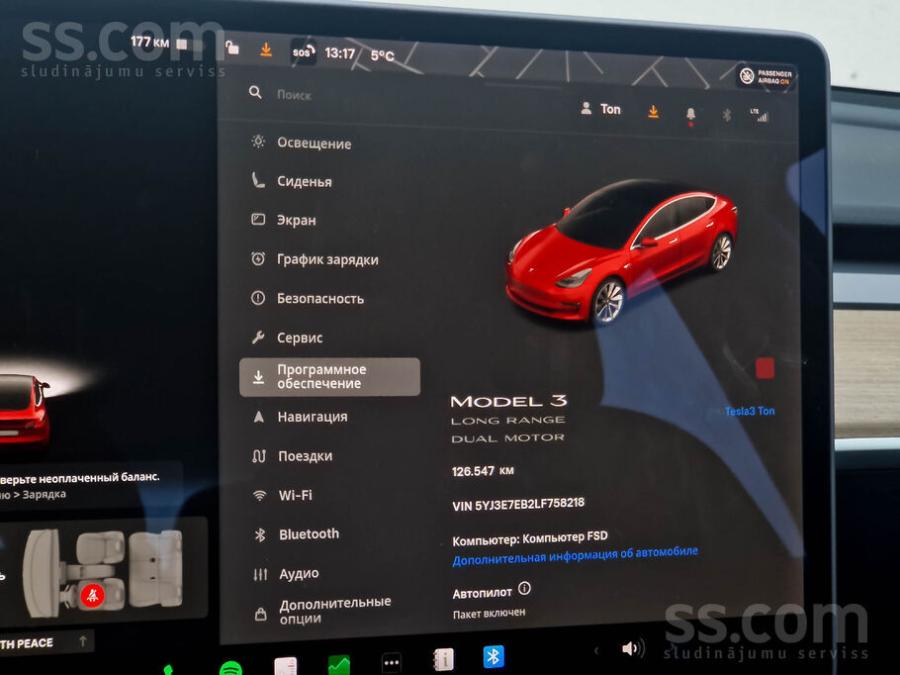 Red Tesla Model 3 2020 in Riga, with an engine capacity of 0.00 L and mileage of 126 thousand km for 21777 €, photo 14 on AUTOMOTO.COM.LV