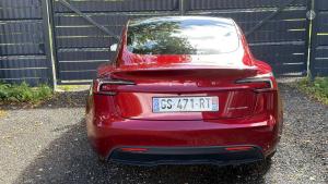 Red Tesla Model 3 2023 in Jonava, with an engine capacity of 0.00 L and mileage of 70 thousand km for 30500 €, photo 7 on AUTOMOTO.COM.LV