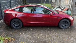 Red Tesla Model 3 2023 in Jonava, with an engine capacity of 0.00 L and mileage of 70 thousand km for 30500 €, photo 13 on AUTOMOTO.COM.LV