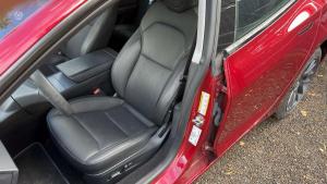Red Tesla Model 3 2023 in Jonava, with an engine capacity of 0.00 L and mileage of 70 thousand km for 30500 €, photo 18 on AUTOMOTO.COM.LV