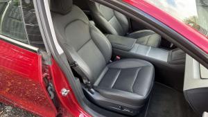 Red Tesla Model 3 2023 in Jonava, with an engine capacity of 0.00 L and mileage of 70 thousand km for 30500 €, photo 20 on AUTOMOTO.COM.LV