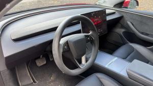 Red Tesla Model 3 2023 in Jonava, with an engine capacity of 0.00 L and mileage of 70 thousand km for 30500 €, photo 22 on AUTOMOTO.COM.LV