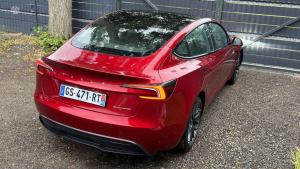 Red Tesla Model 3 2023 in Jonava, with an engine capacity of 0.00 L and mileage of 70 thousand km for 29600 €, photo  on AUTOMOTO.COM.LV