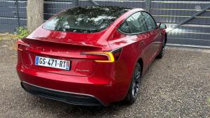 Red Tesla Model 3 2023 in Jonava, with an engine capacity of 0.00 L and mileage of 70 thousand km for 29600 €, photo 10 on AUTOMOTO.COM.LV