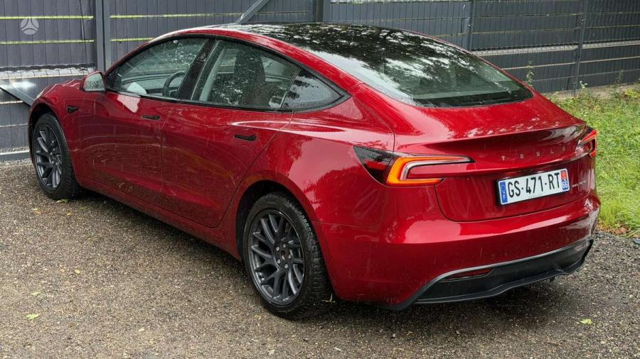 Red Tesla Model 3 2023 in Jonava, with an engine capacity of 0.00 L and mileage of 70 thousand km for 29600 €, photo 12 on AUTOMOTO.COM.LV