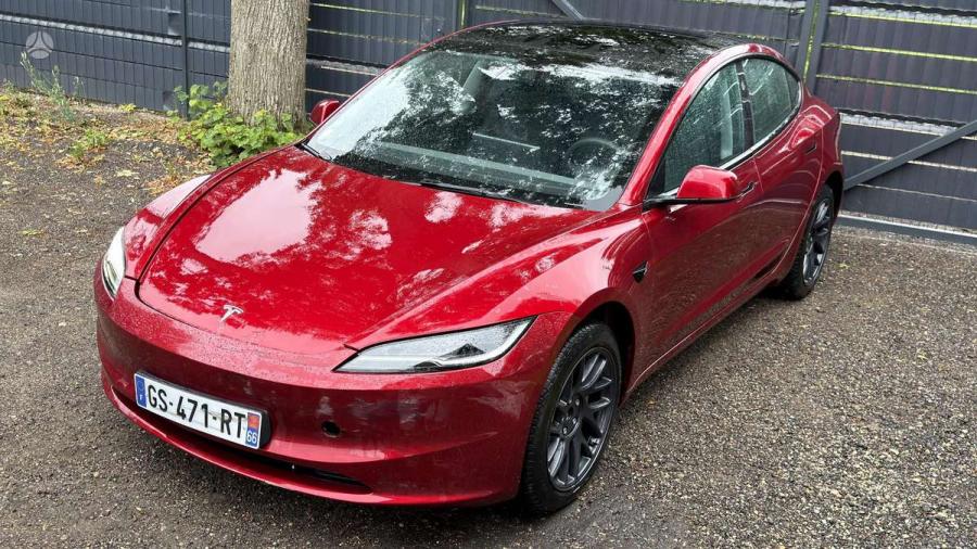 Red Tesla Model 3 2023 in Jonava, with an engine capacity of 0.00 L and mileage of 70 thousand km for 29600 €, photo 14 on AUTOMOTO.COM.LV