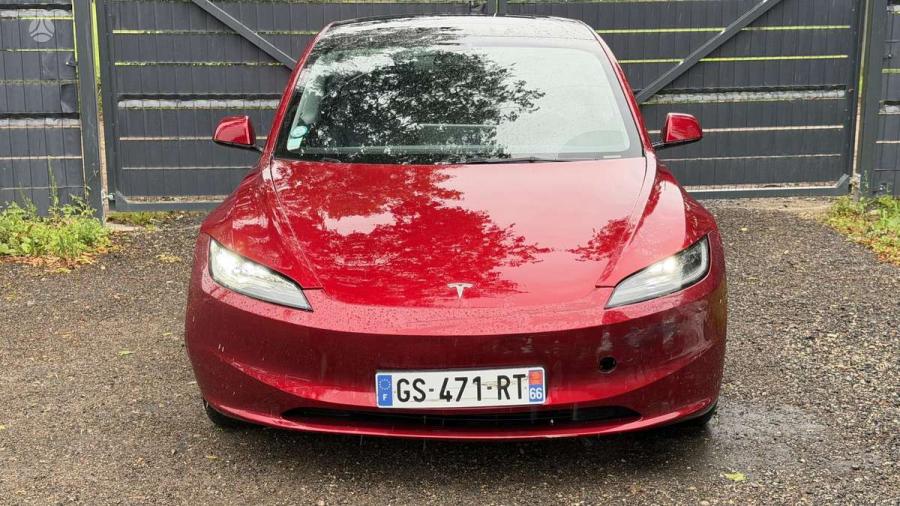 Red Tesla Model 3 2023 in Jonava, with an engine capacity of 0.00 L and mileage of 70 thousand km for 29600 €, photo 15 on AUTOMOTO.COM.LV